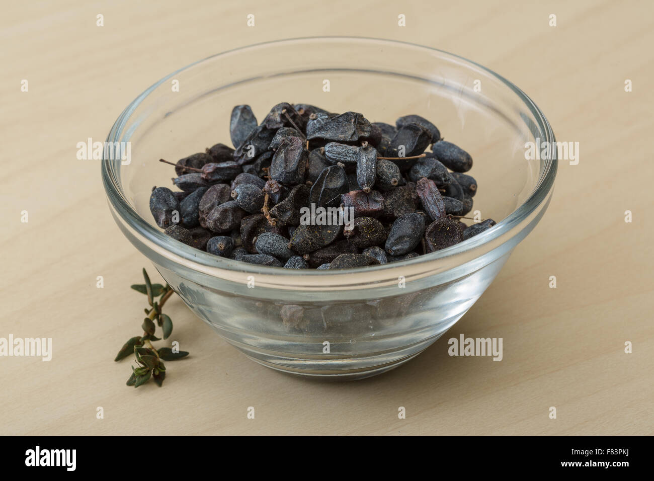 Dry Barberries heap on the wood background Stock Photo - Alamy