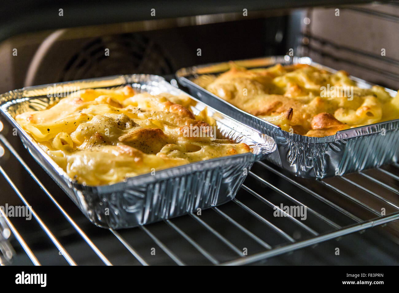 maccheroni with cheese in oven Stock Photo - Alamy