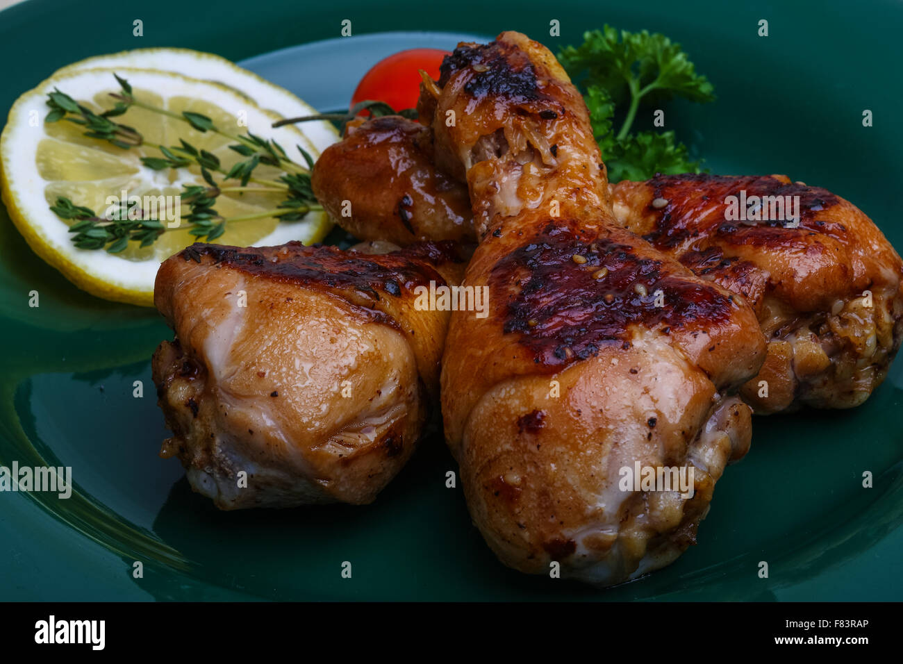Roasted chicken legs in teriyaki sause with thyme Stock Photo - Alamy