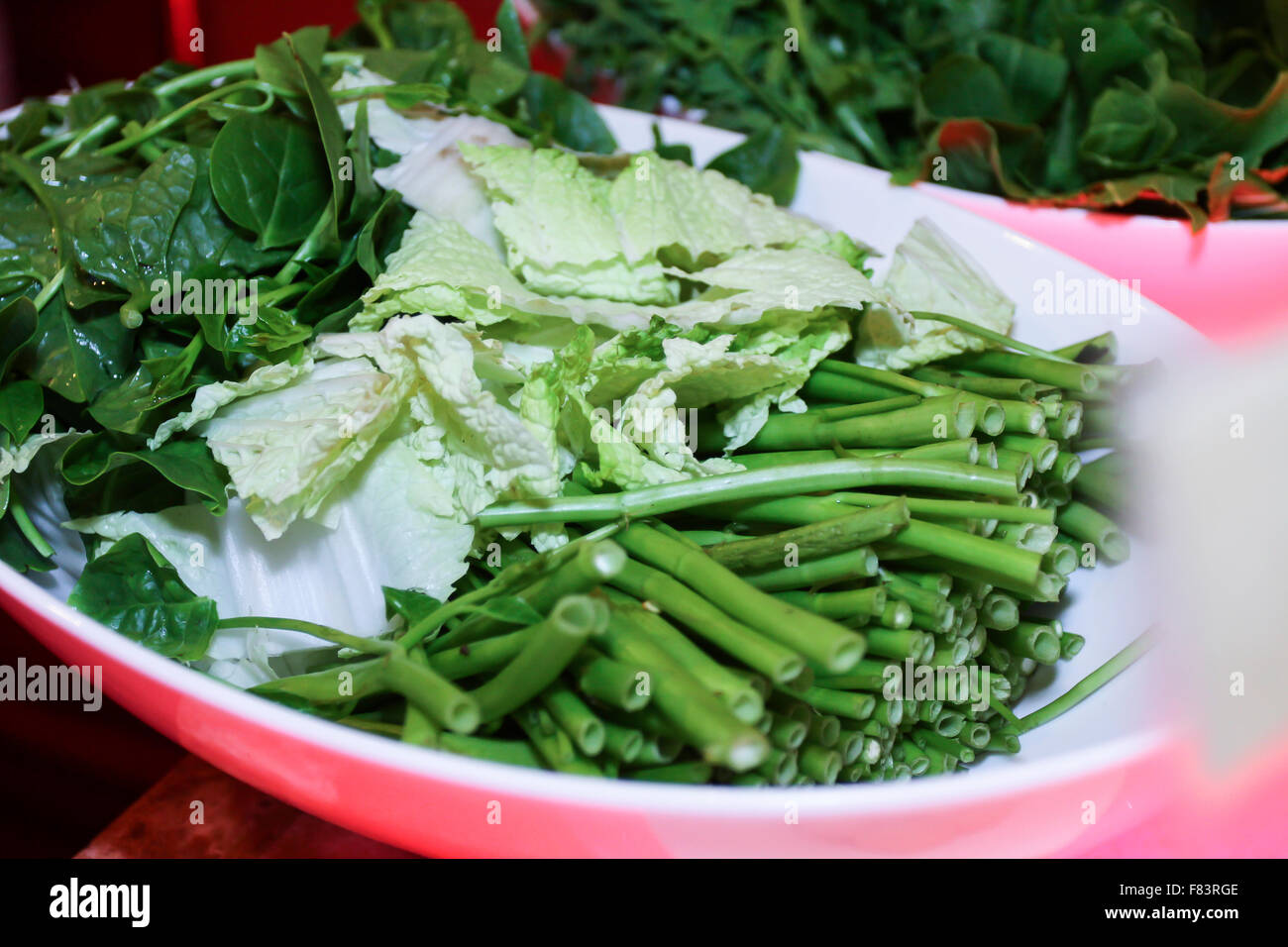 Stir Fried Water Spinach on bamboo mat, vietnamese food Stock Photo - Alamy