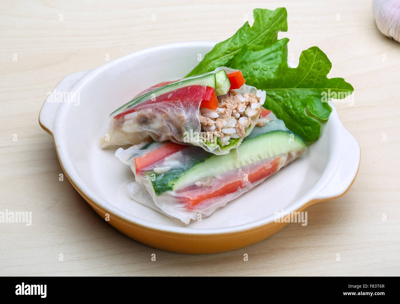Vietnamese Spring rolls with tuna and salad leaves Stock Photo - Alamy