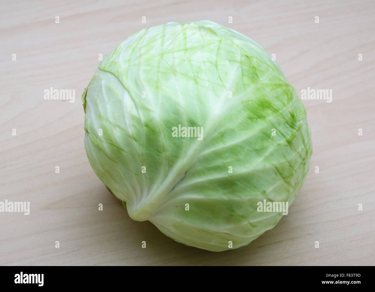 Fresh ripe cabbage on the wood background Stock Photo - Alamy