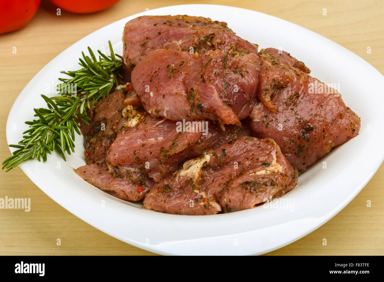 Raw marinated meat for bbq with herbs and spices Stock Photo - Alamy