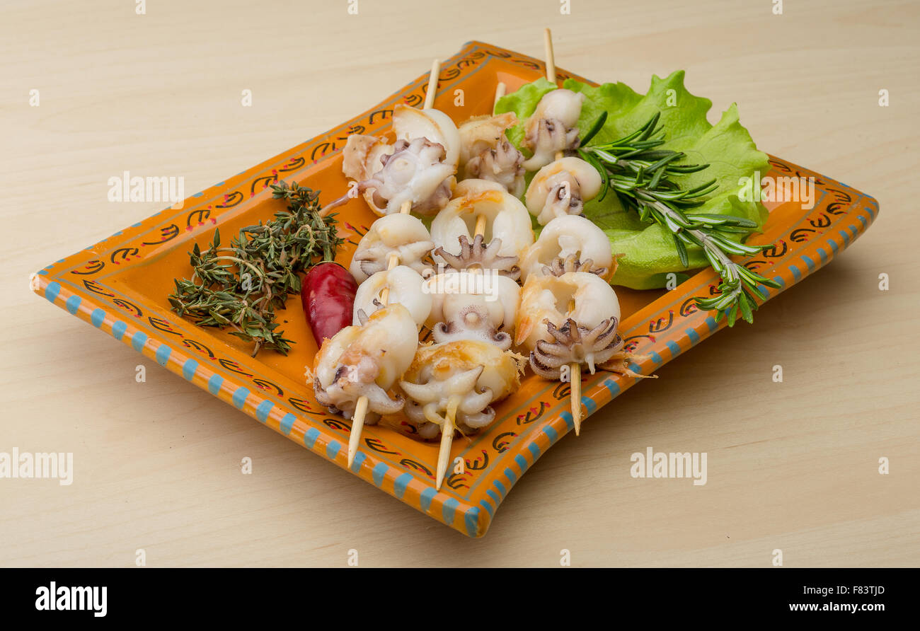 Grilled cuttlefish bbq with rosemary and pepper Stock Photo - Alamy