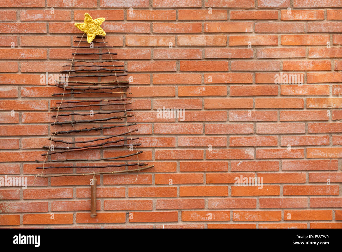 a horizontal frontal view of some handmade xmas decorations: a tree ...