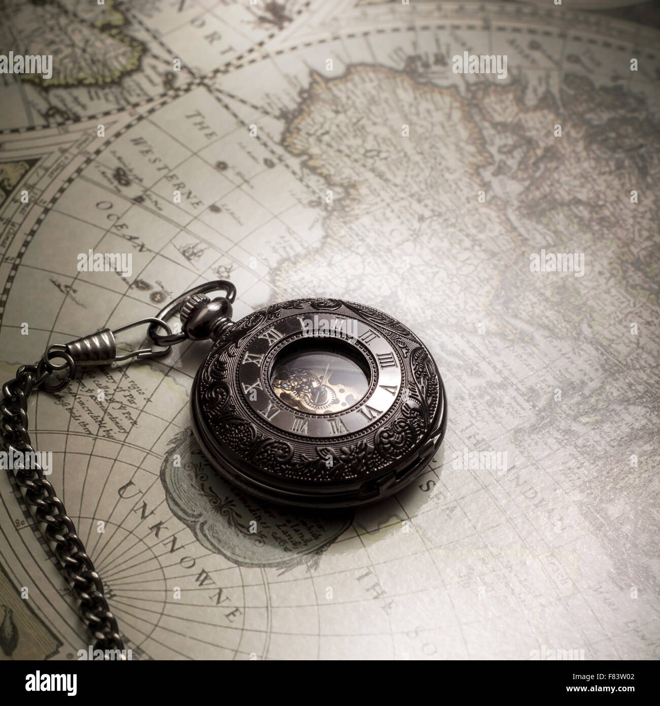 Vintage antique pocket watch on old map background, close up Stock ...