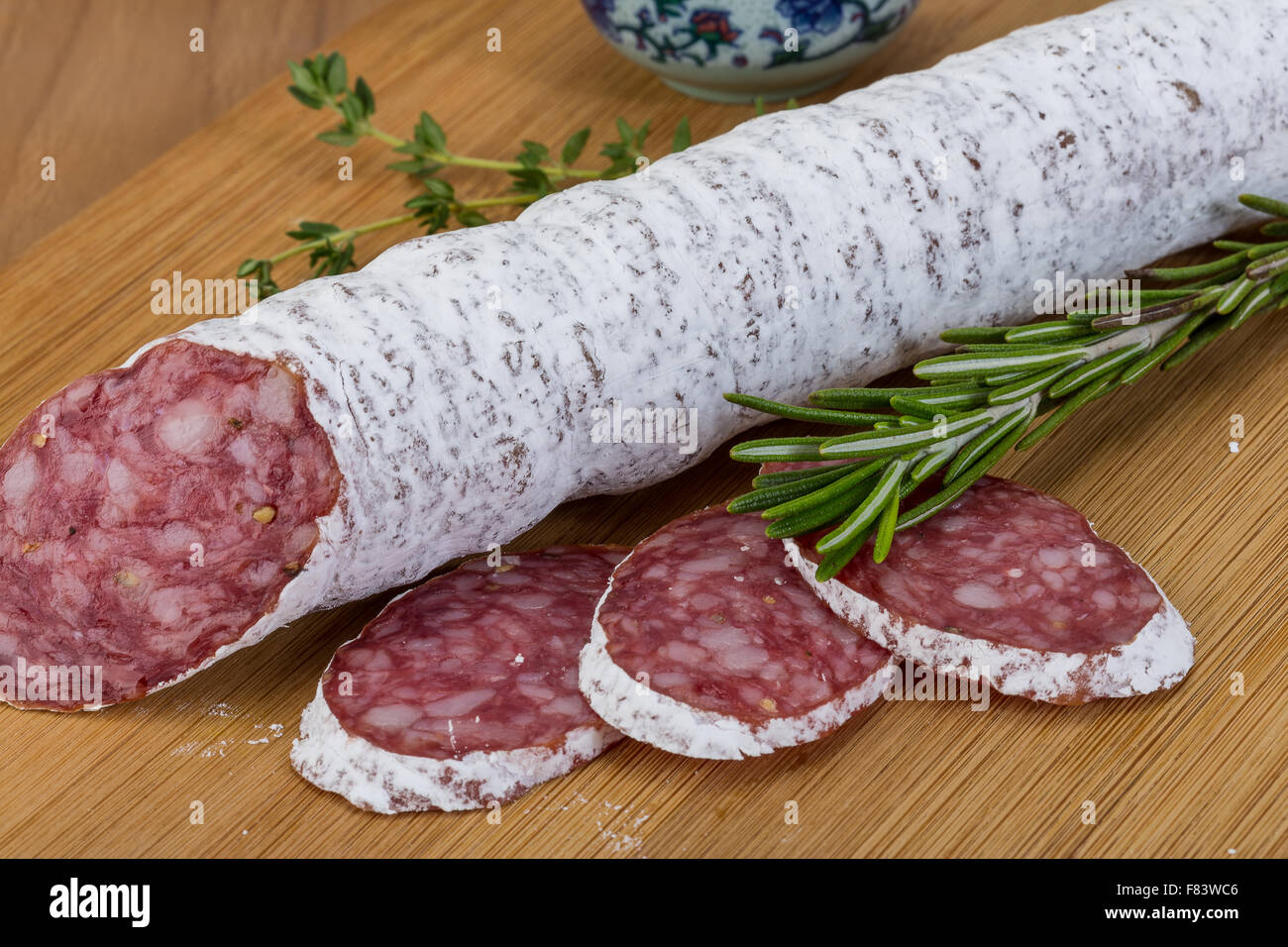 Fuet sausage - Spanish meat sliced with herbs Stock Photo - Alamy