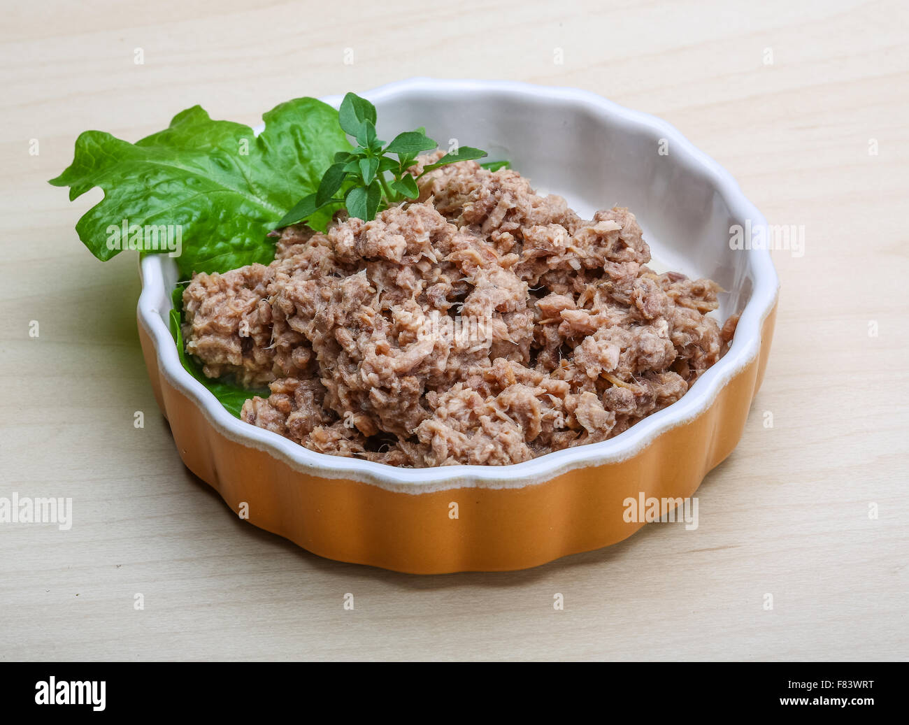 Canned tuna fillet for salad on the wod bckground Stock Photo - Alamy