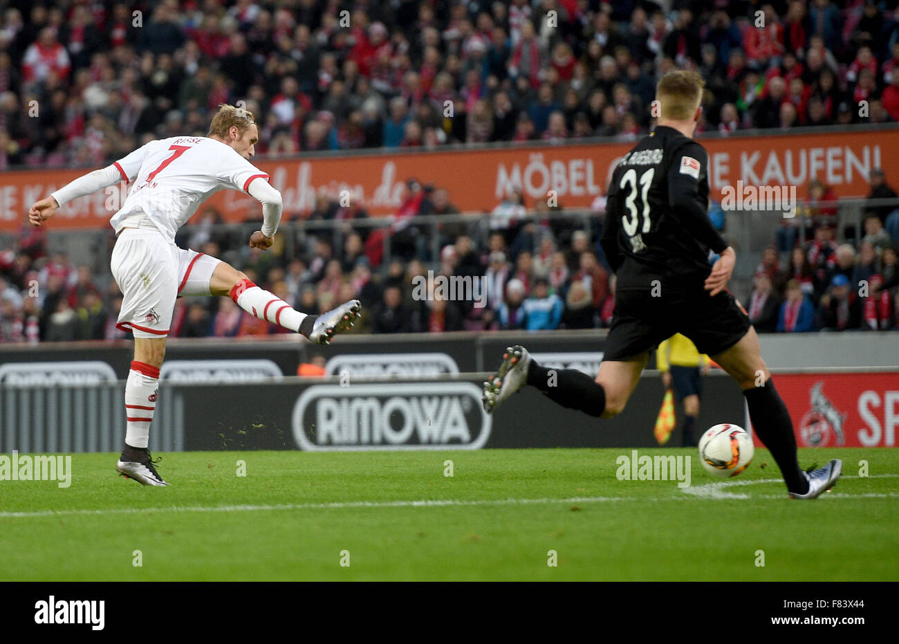 Cologne, Germany. 5th Dec, 2015. Cologne's Marcel Risse shoots at goal ...