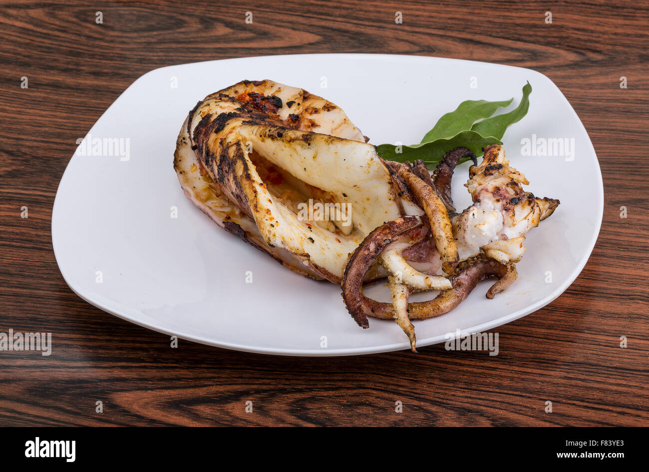 Grilled cuttlefish with spices in the bowl Stock Photo - Alamy