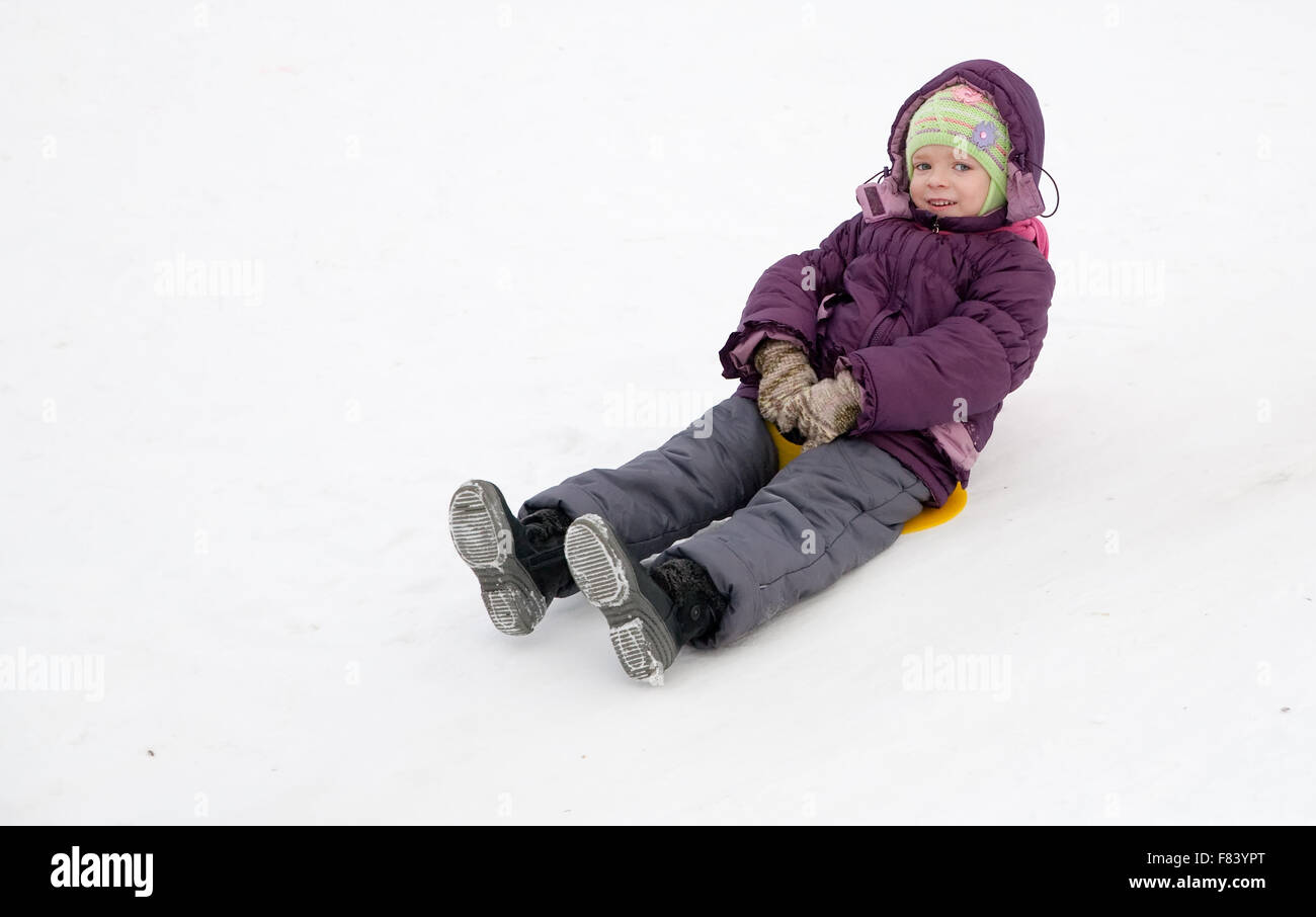 Child sliding ice hi-res stock photography and images - Alamy