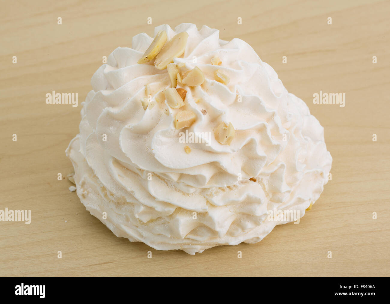 White meringue with nut on the wood background Stock Photo - Alamy
