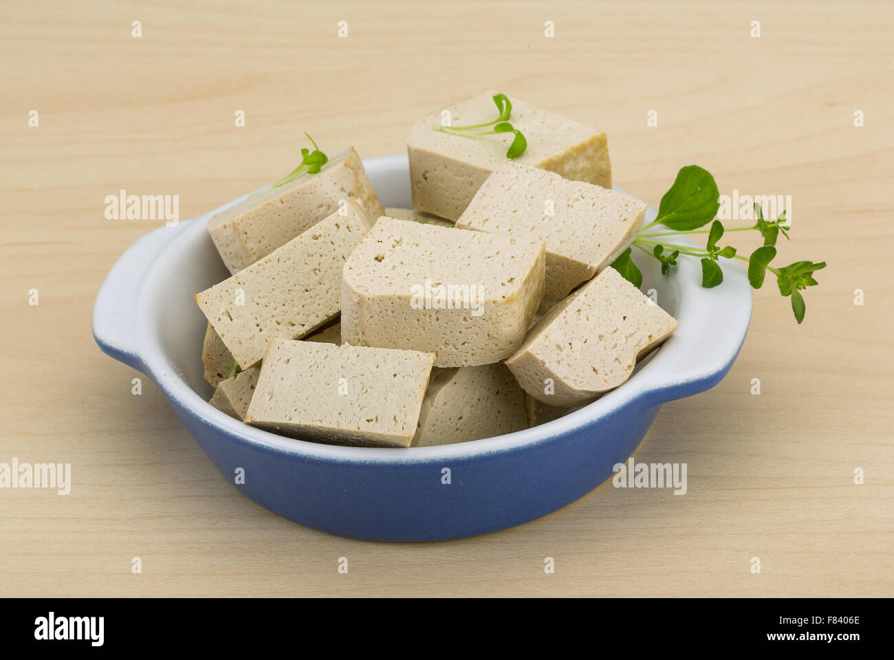 Tofu - soya cheese with herbs on the wood background Stock Photo - Alamy