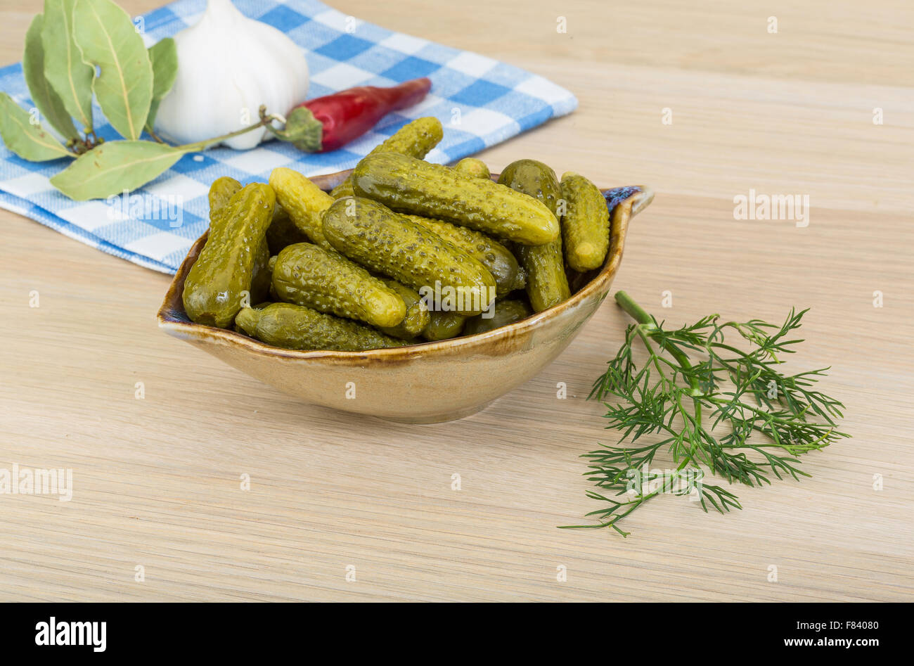 Pickled small cucumber with dill and spices Stock Photo - Alamy