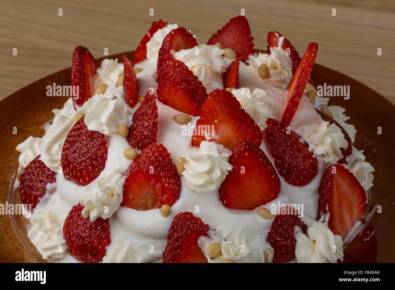 Homemade Strawberry cake with cream and cedar nut Stock Photo - Alamy