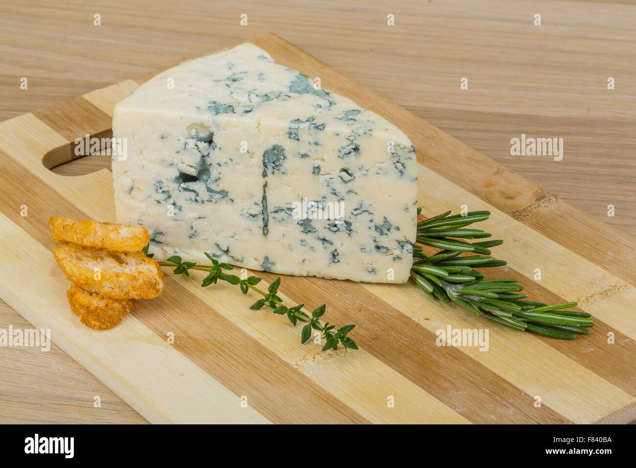 Blue cheese with mold on the wood background Stock Photo - Alamy