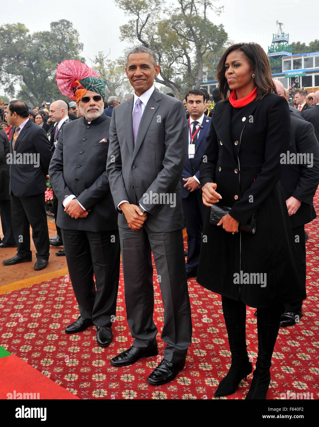 U.S. President Barack Obama and First Lady Michelle Obama stand with ...