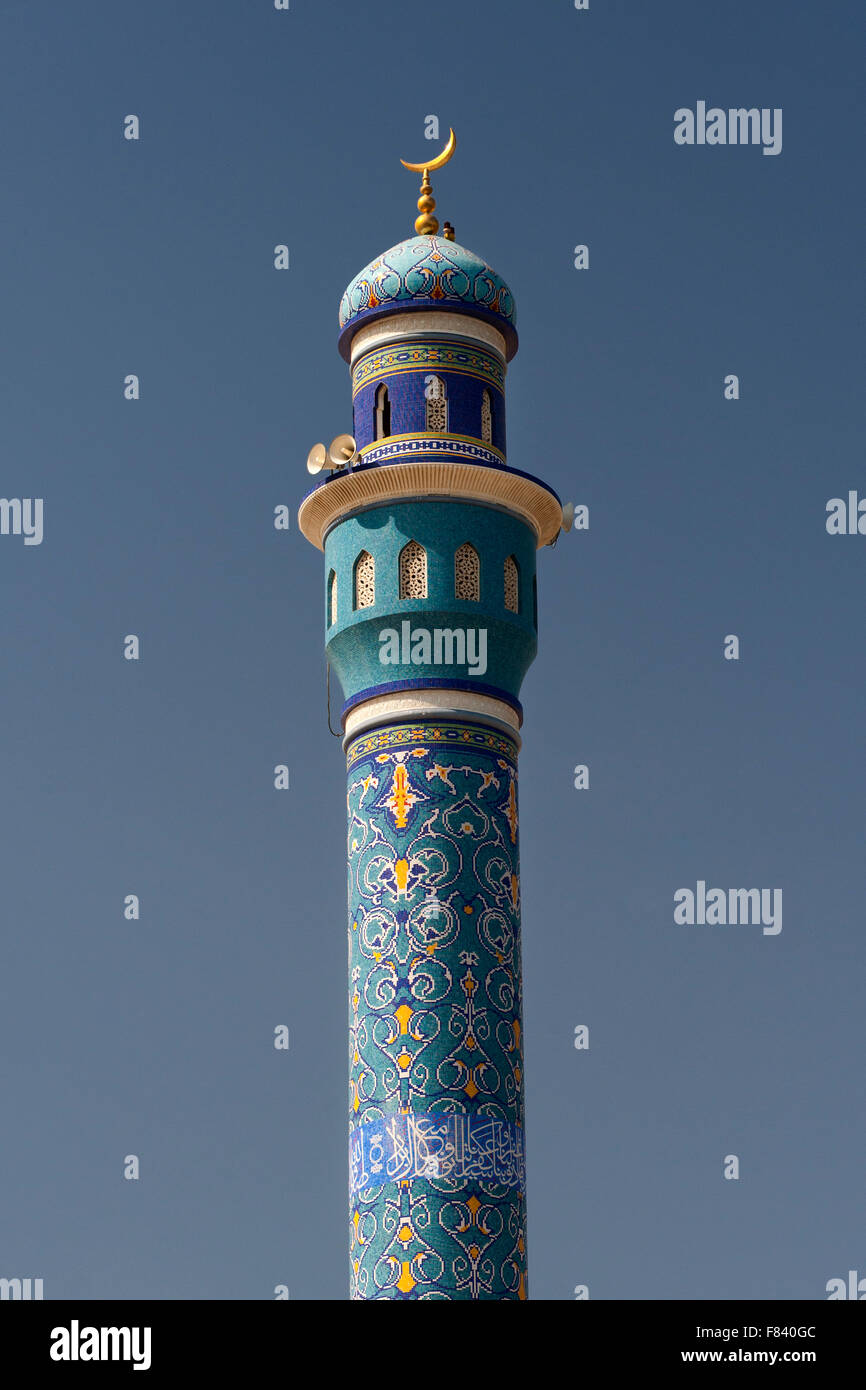 Minaret of the Al Lawati mosque in the Mutrah district of Muscat, the ...