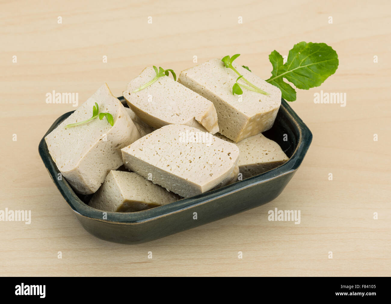 Tofu - soya cheese with herbs on the wood background Stock Photo - Alamy