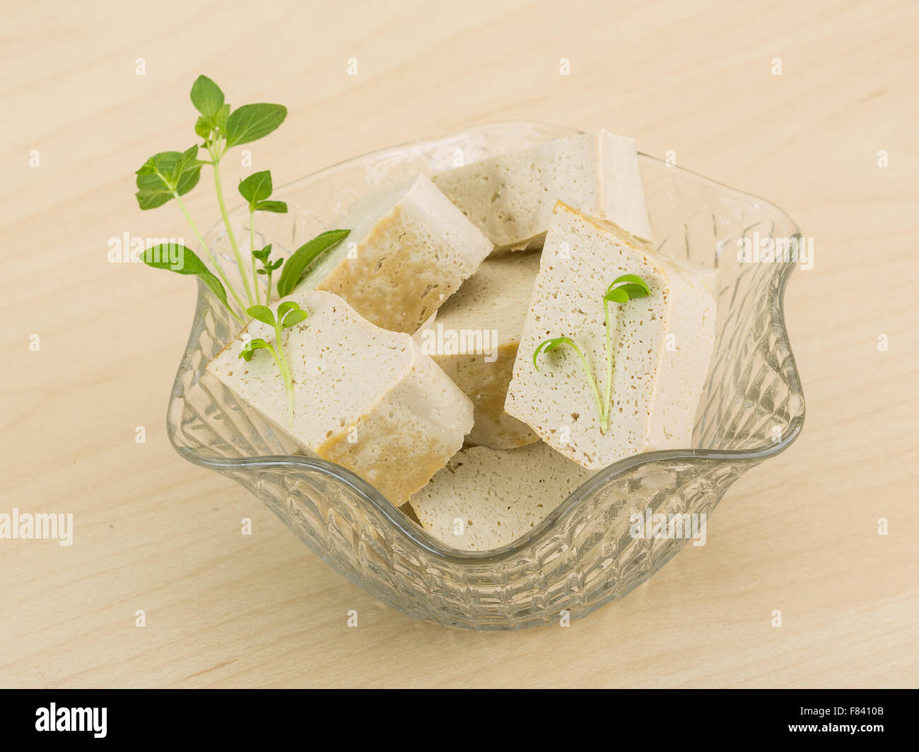 Tofu - soya cheese with herbs on the wood background Stock Photo - Alamy