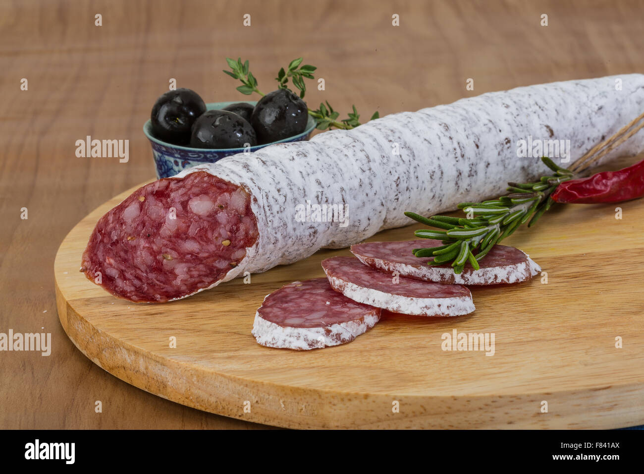 Fuet sausage - Spanish meat sliced with herbs Stock Photo - Alamy