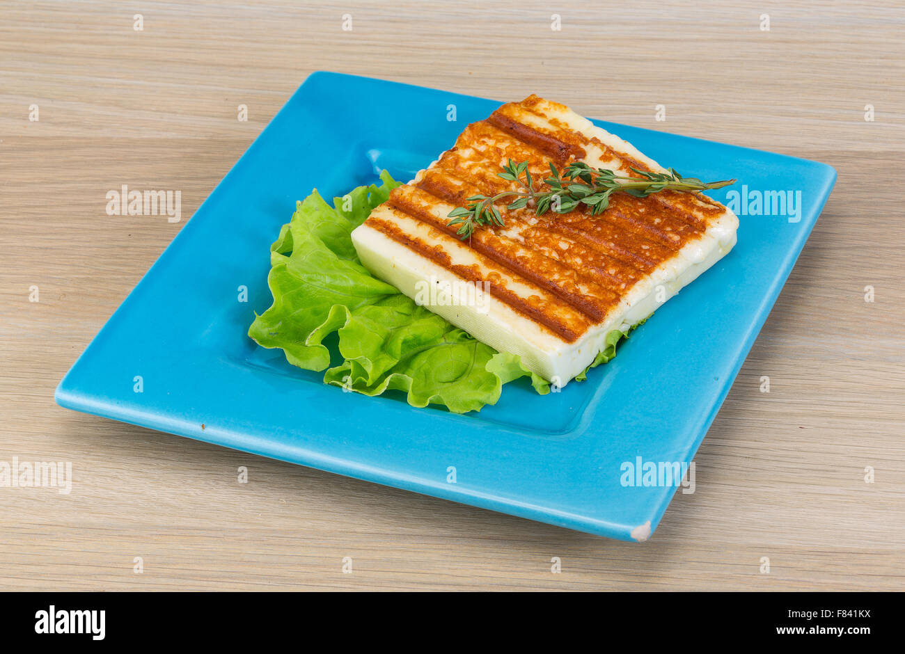 Deep Fried cheese with thyme and salad Stock Photo - Alamy