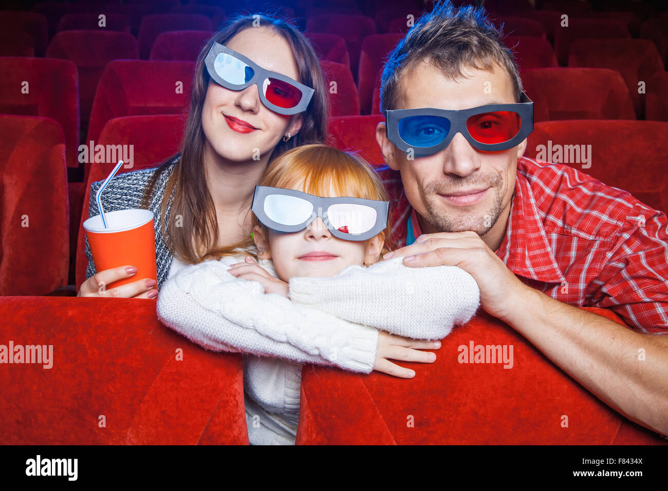 The spectators in the cinema Stock Photo - Alamy