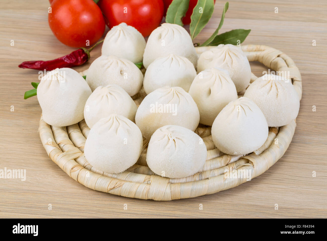 Georgian dumplings - Khinkali with minced meat and herbs Stock Photo ...