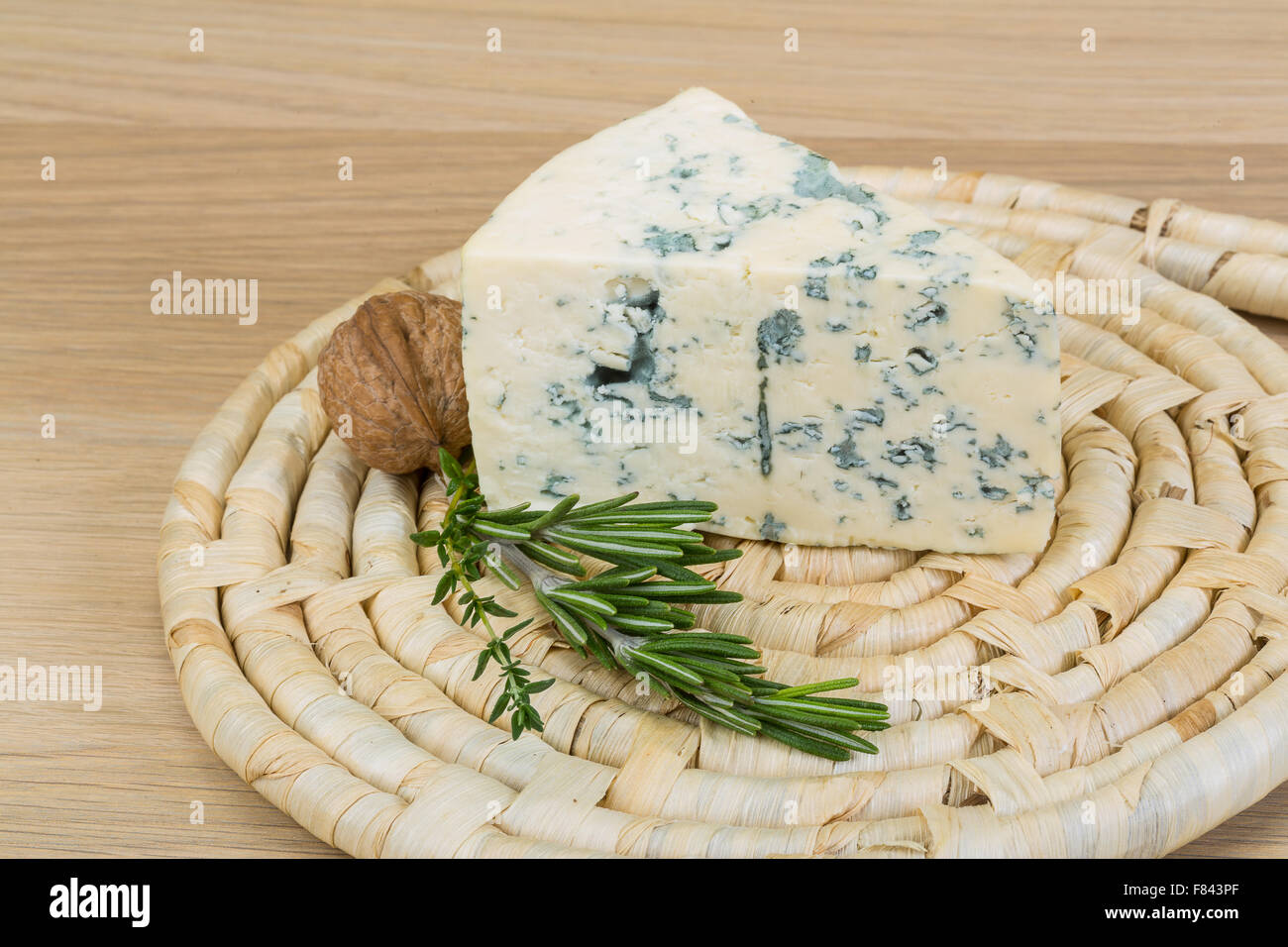 Blue cheese with mold on the wood background Stock Photo - Alamy