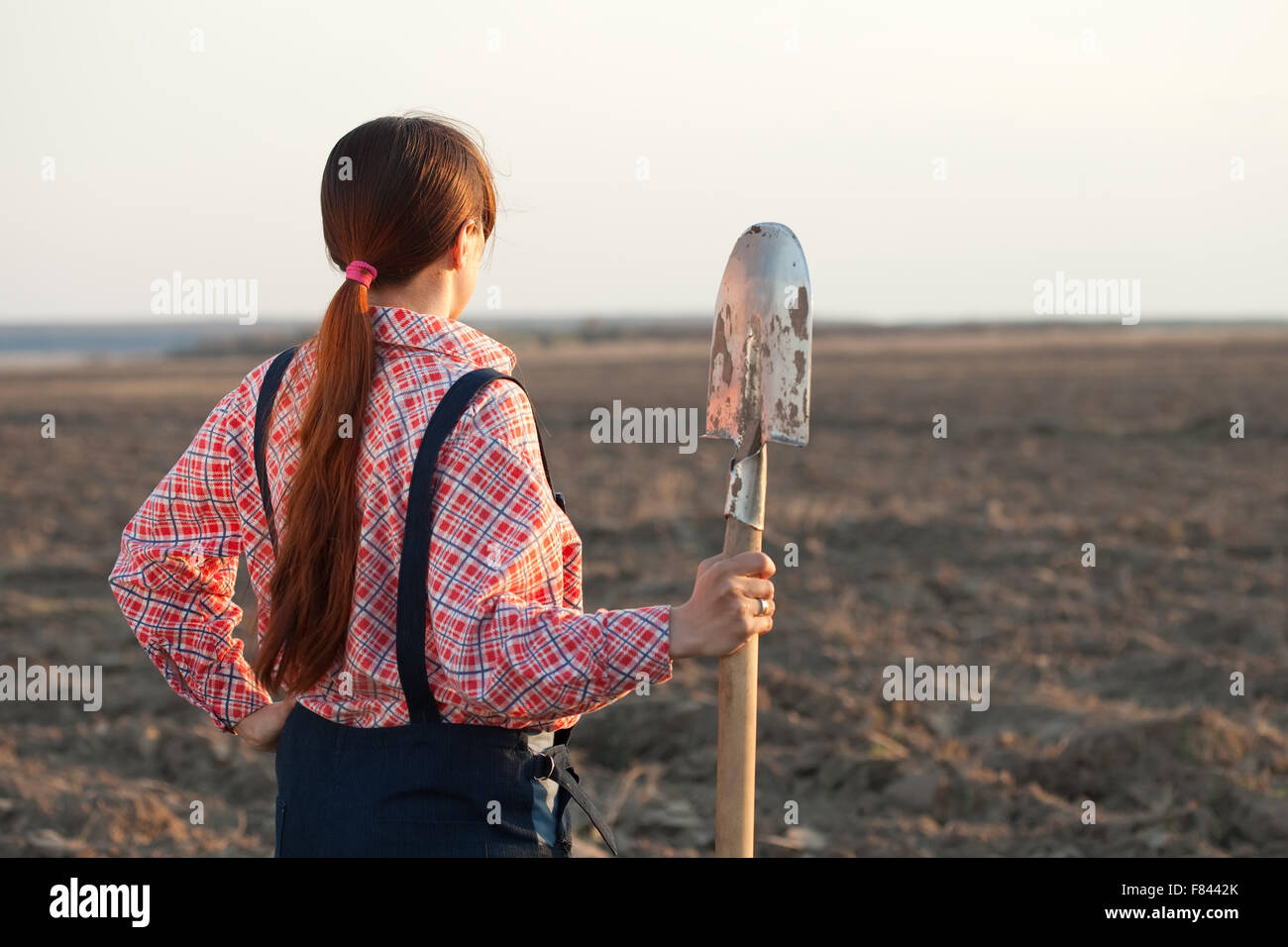 Female farmer spade in spring hi-res stock photography and images - Alamy