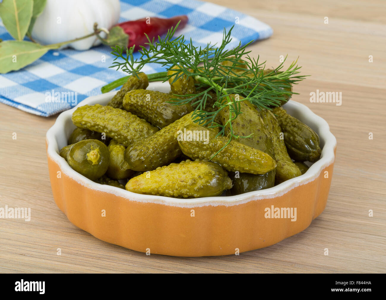 Pickled small cucumber with dill and spices Stock Photo - Alamy