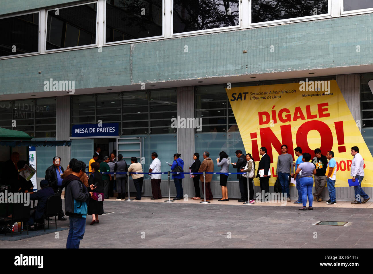 People queuing outside local tax office in central Lima, Peru Stock ...