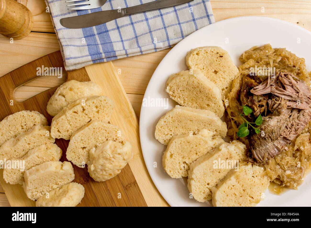Czech traditional cuisine dumpling, cabbage and pork meat Stock Photo ...