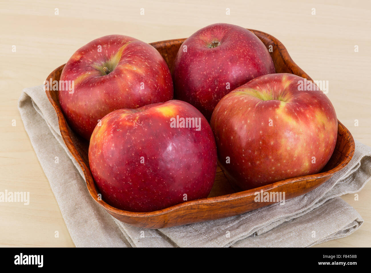 Bright fresh Red apples on the wood background Stock Photo - Alamy