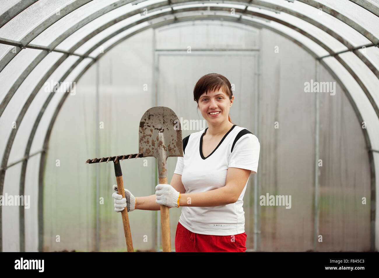 Portrait happy farmer spade hi-res stock photography and images - Alamy