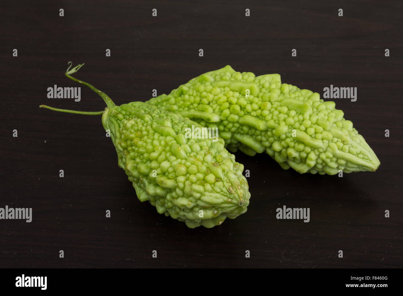 Asian vegetable - momordica on the wood background Stock Photo - Alamy