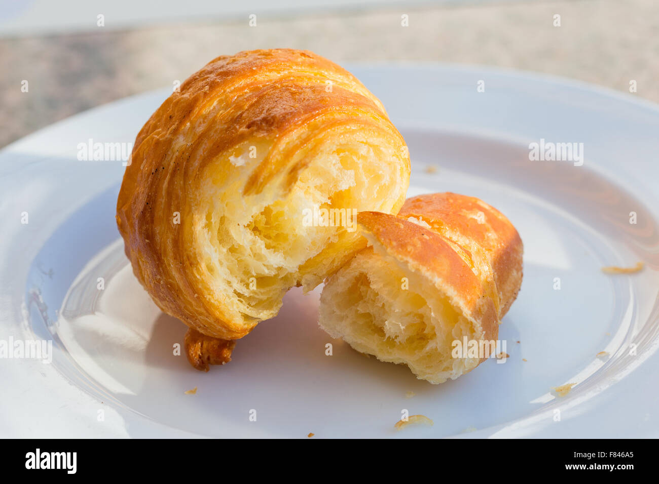Fresh baked Croissant in the white bowl Stock Photo - Alamy