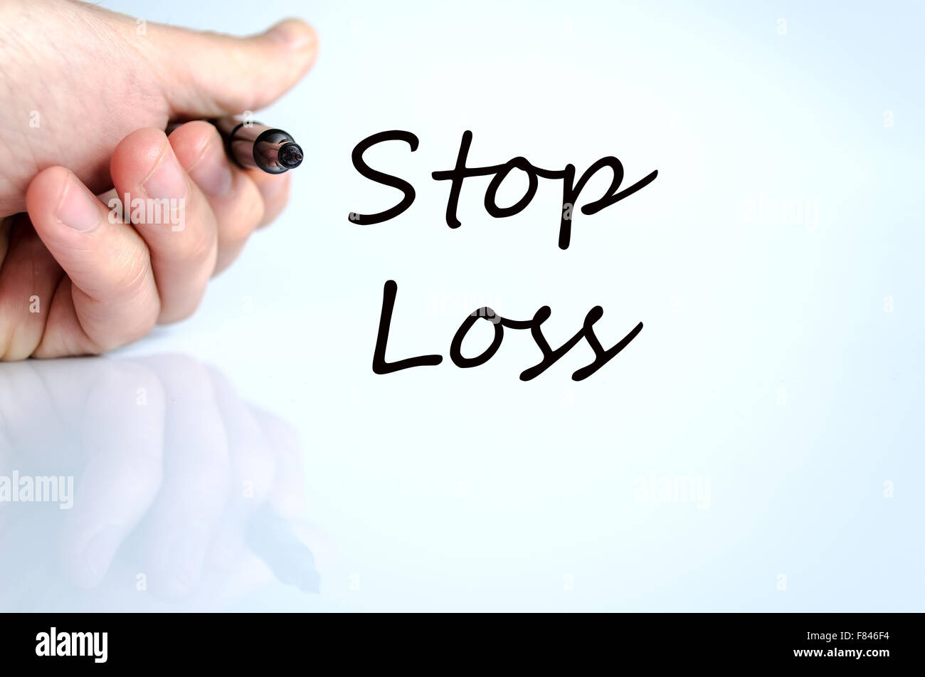 Stop loss text concept isolated over white background Stock Photo - Alamy