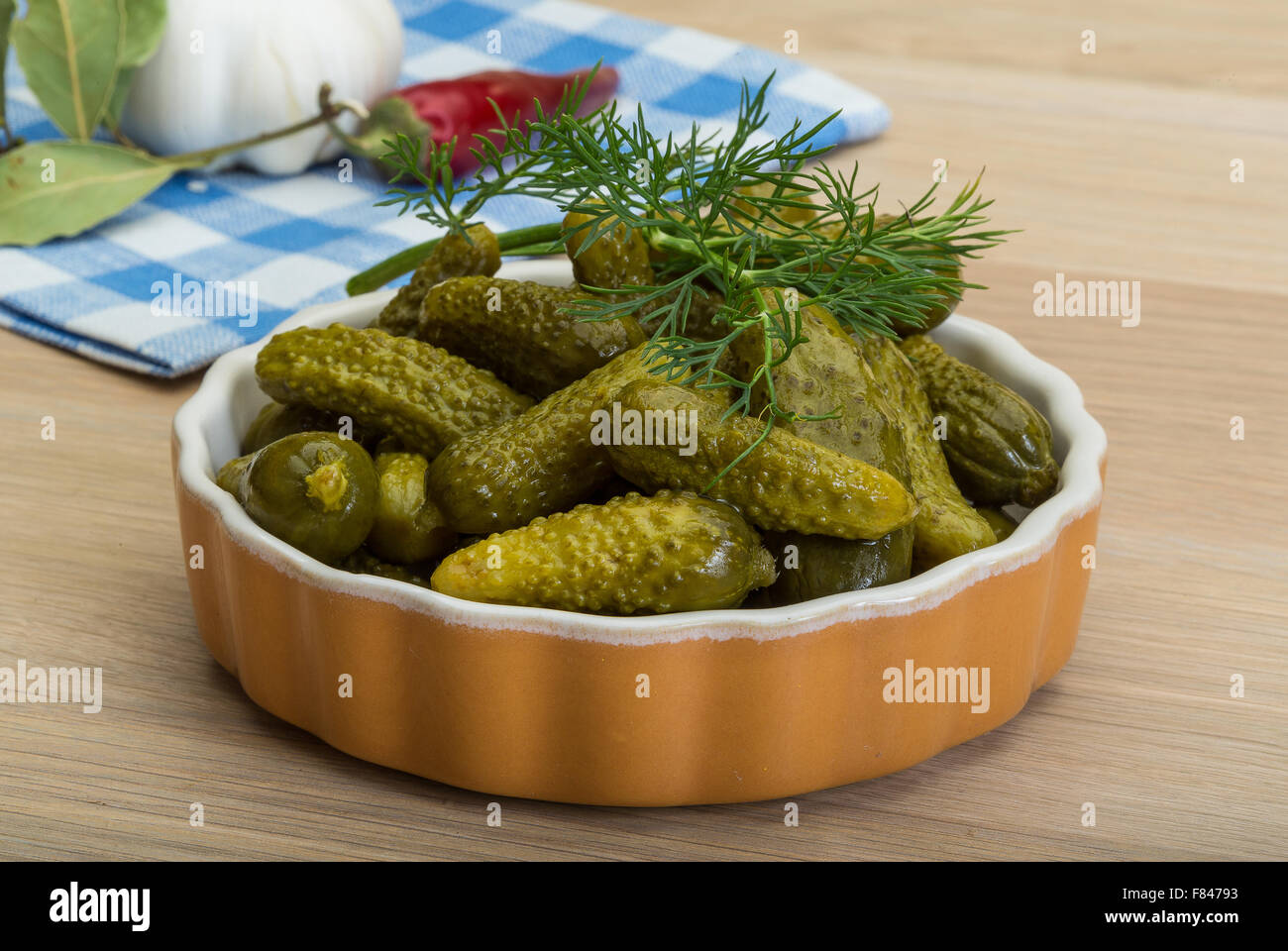 Pickled small cucumber with dill and spices Stock Photo - Alamy