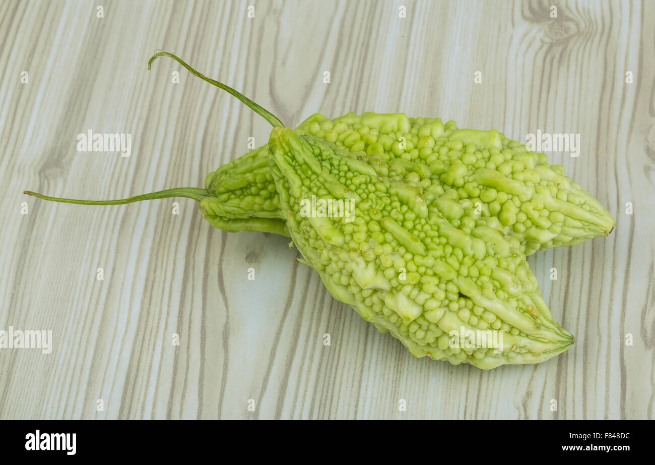 Asian vegetable - momordica on the wood background Stock Photo - Alamy