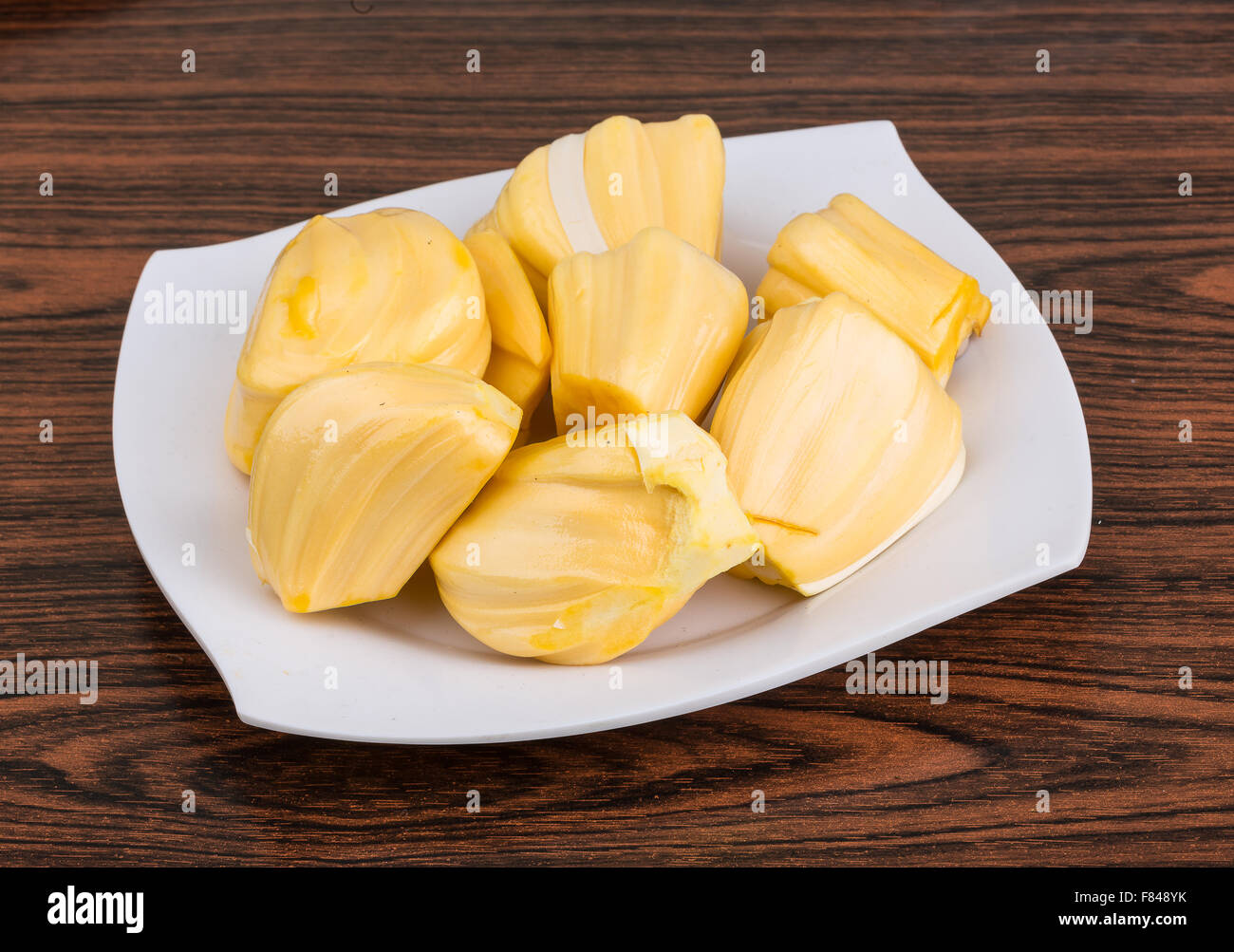 Fresh ripe Jackfruit in the bowl on the wood background Stock Photo - Alamy