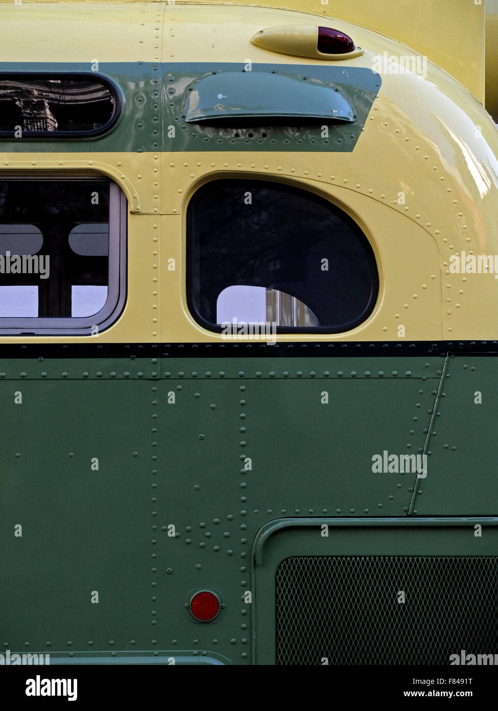 Close up view of the rear & side of a NYC 1956 bus on display during ...