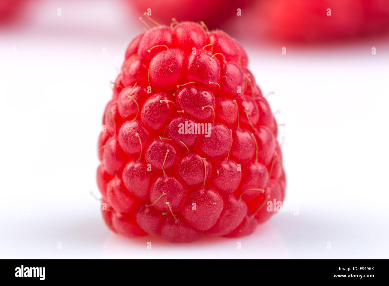 Fresh raspberry isolated on a white background Stock Photo - Alamy