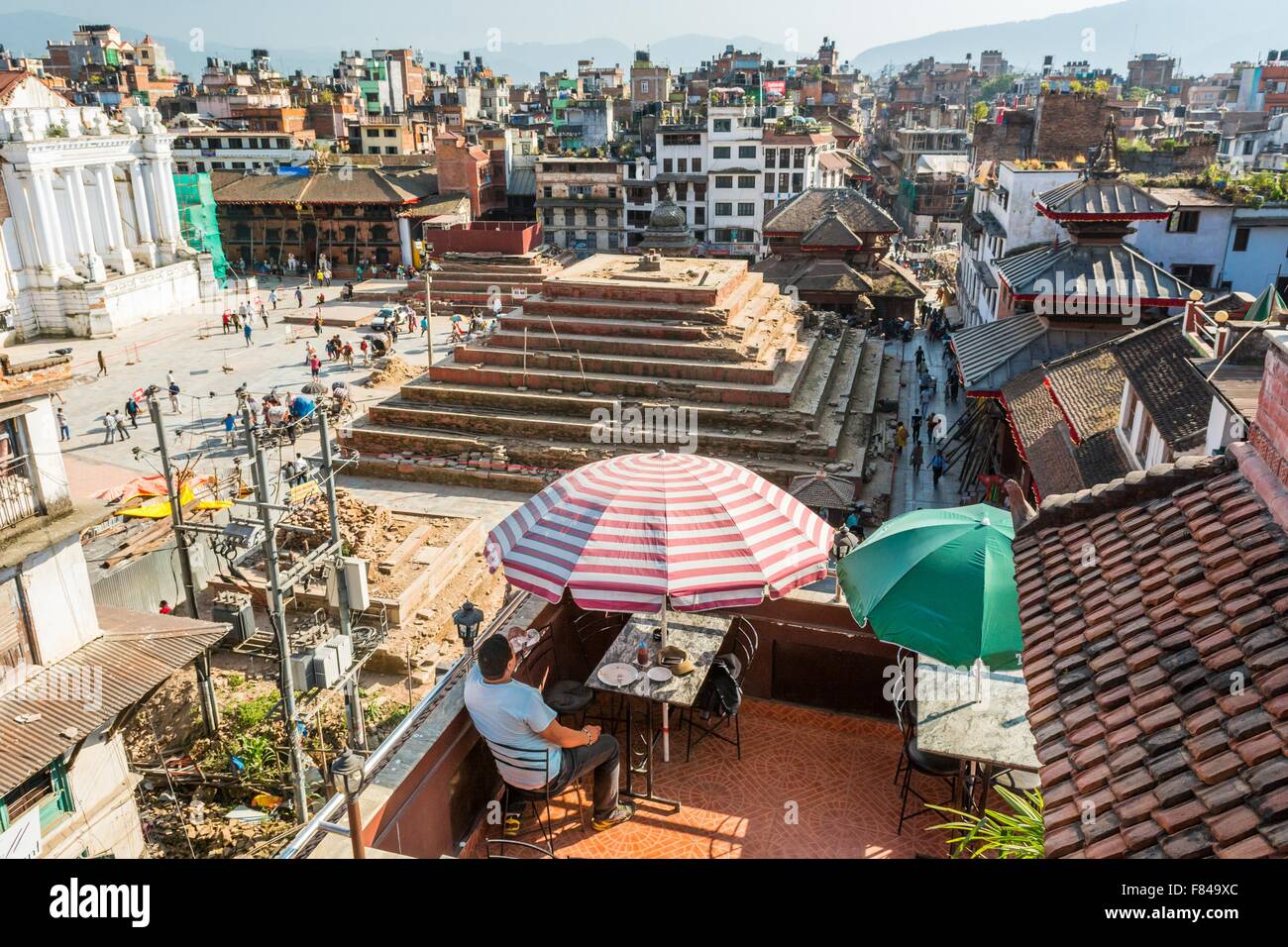 Person enjoying a view from rooftop restaurant Stock Photo - Alamy