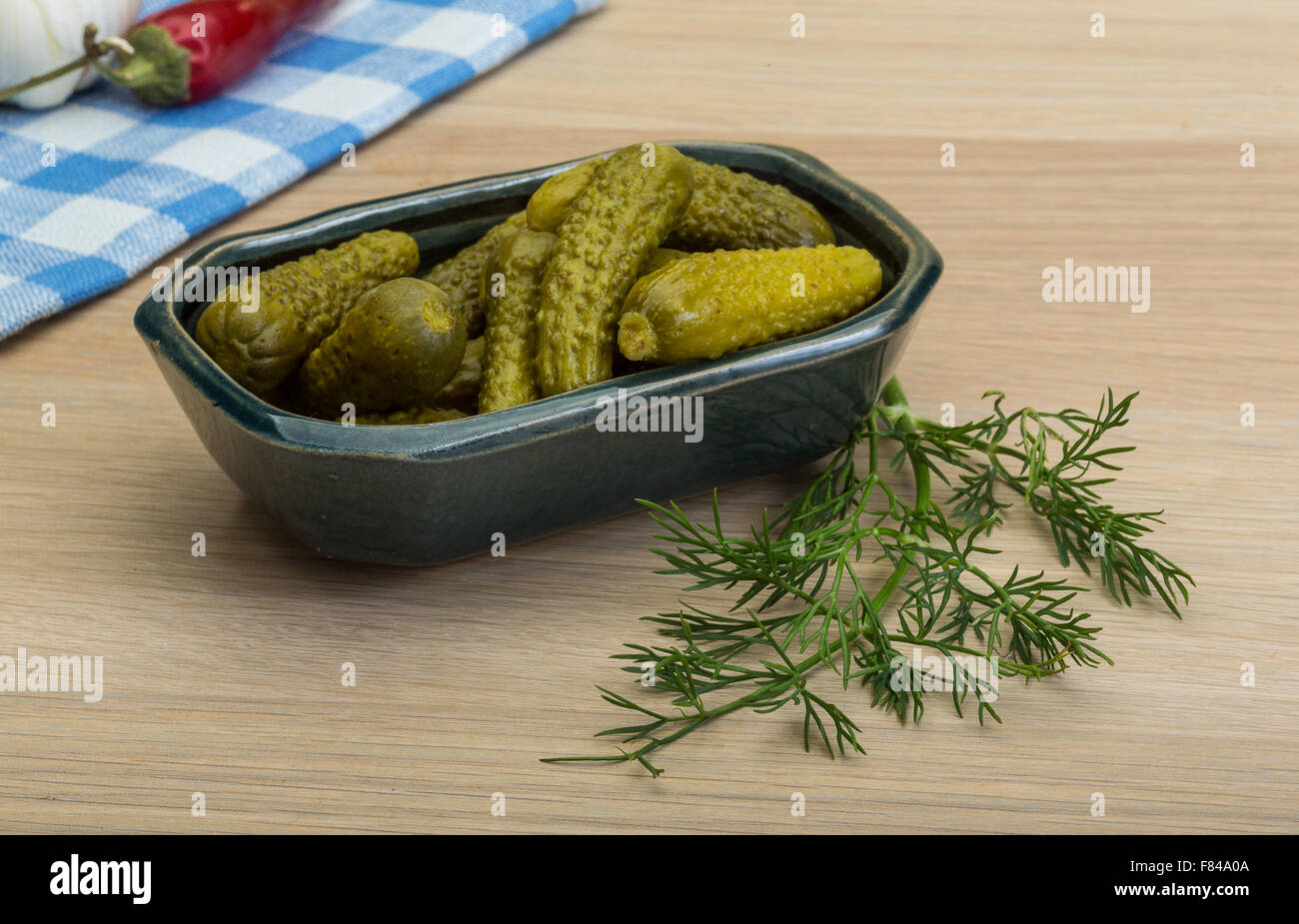Pickled small cucumber with dill and spices Stock Photo - Alamy