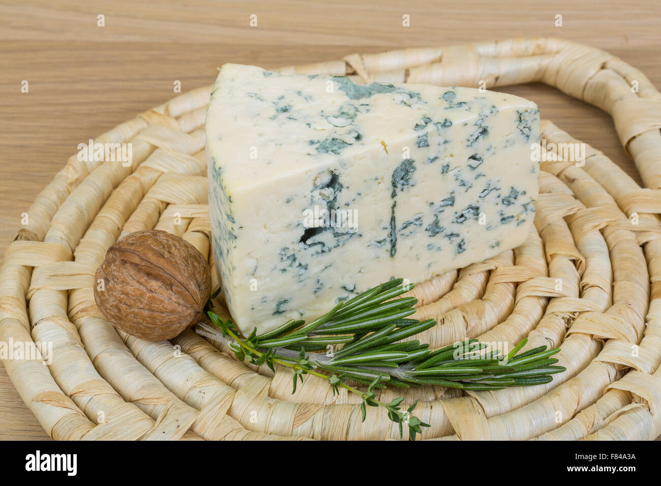 Blue cheese with mold on the wood background Stock Photo - Alamy