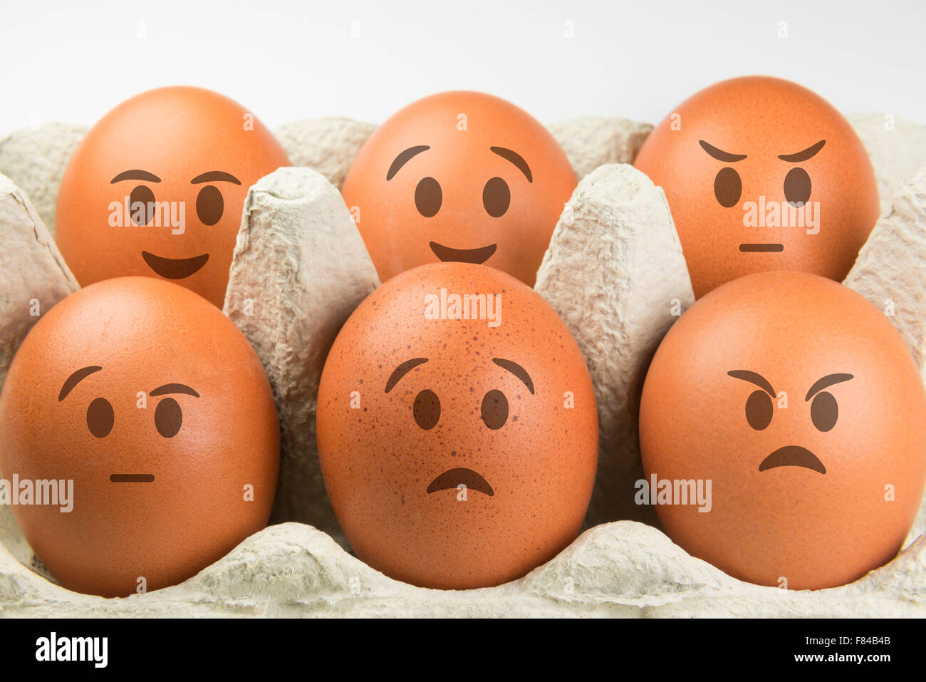 Eggs with faces and various expressions Stock Photo - Alamy
