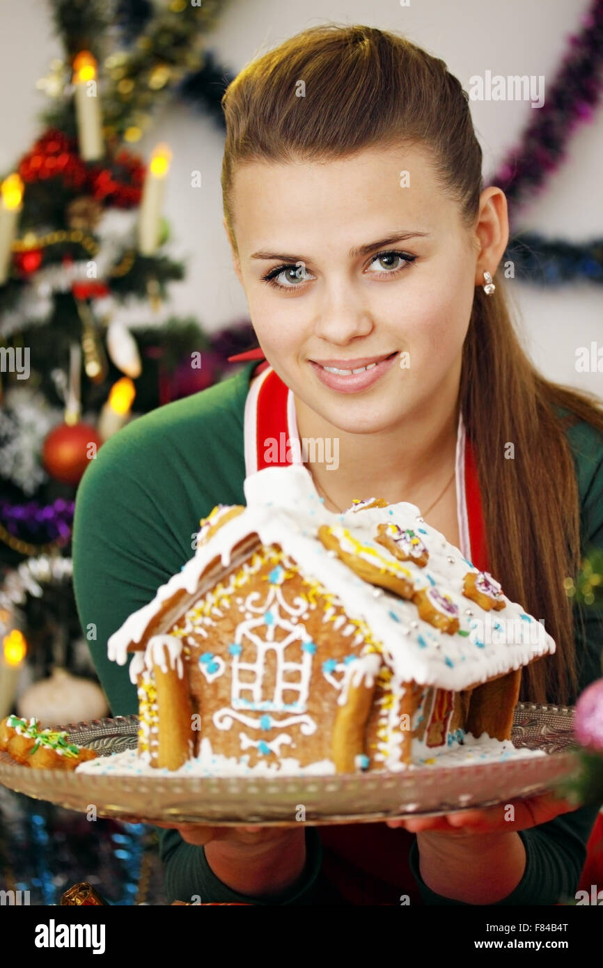 woman and gingerbread house Stock Photo - Alamy