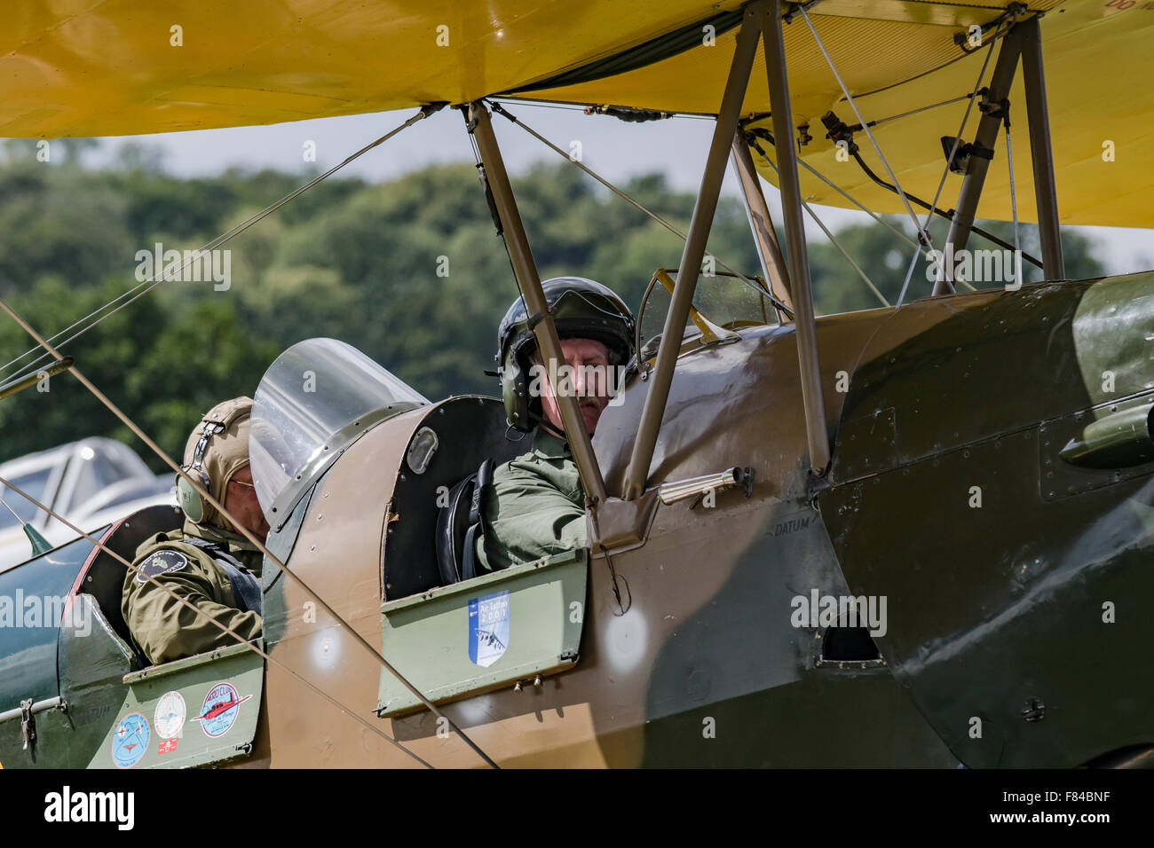 Two pilots in the cockpit of a tiger moth Stock Photo - Alamy