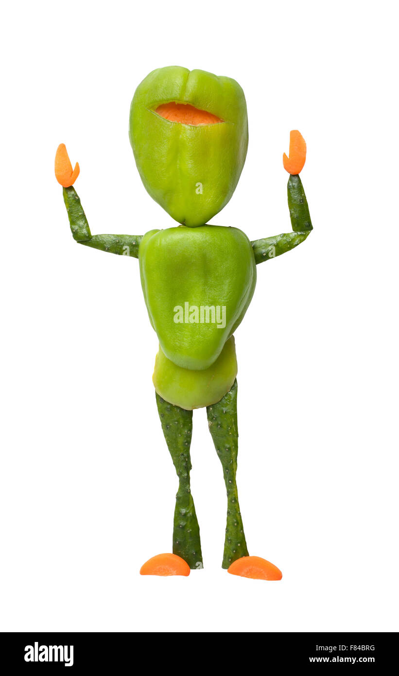Ninja made of green pepper throws hands up Stock Photo - Alamy